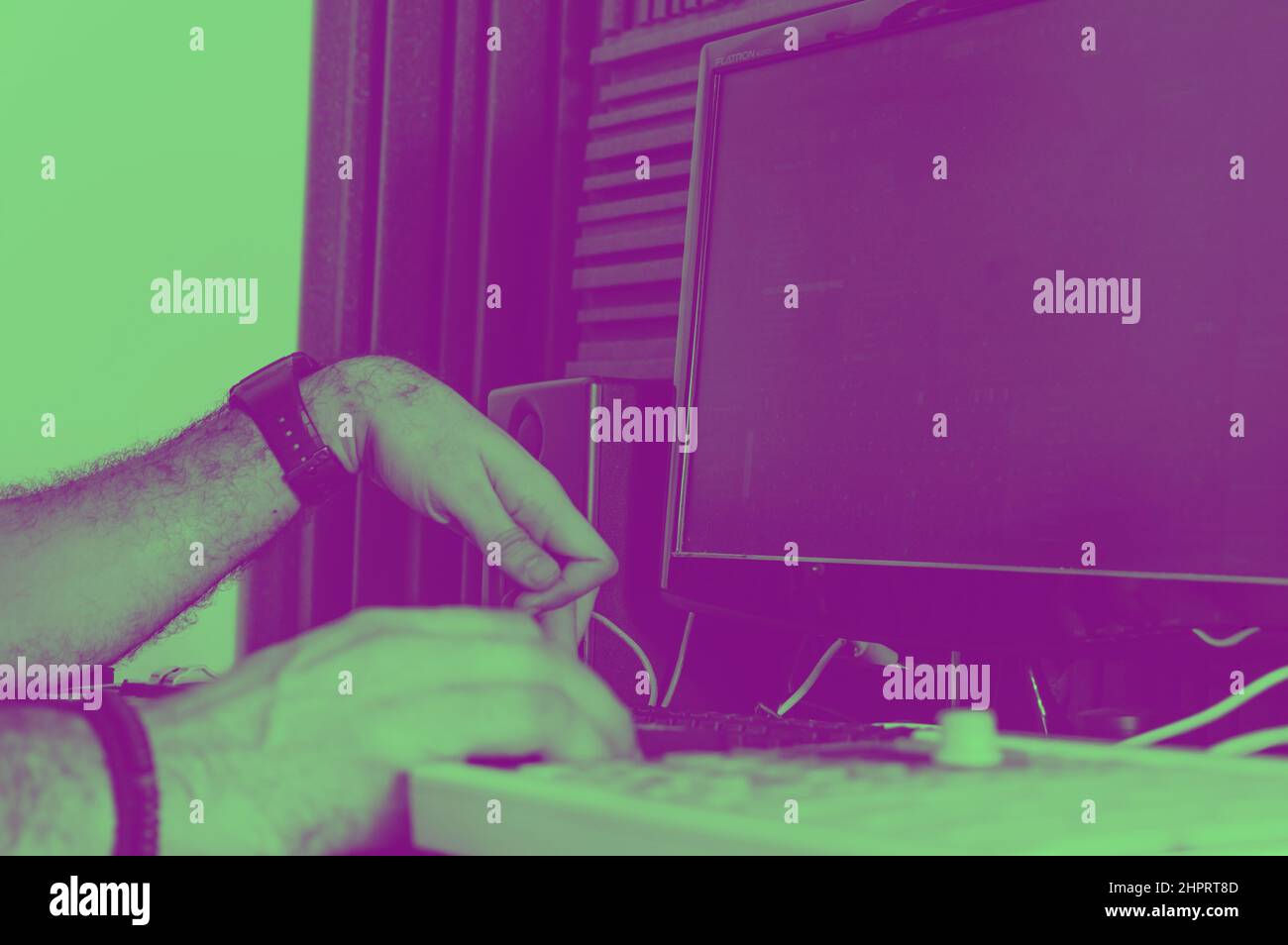 side view of computer monitor and midi controls of home music studio ...