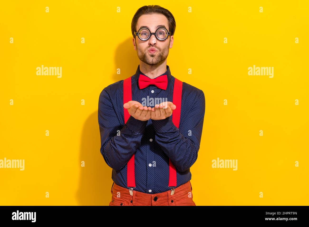 Photo of young handsome guy pouted lips send air kiss romantic feelings ...