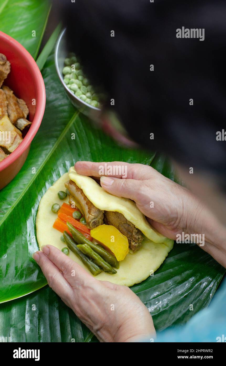 Native woman cooking typical Colombian and Mexican dish Stock Photo - Alamy