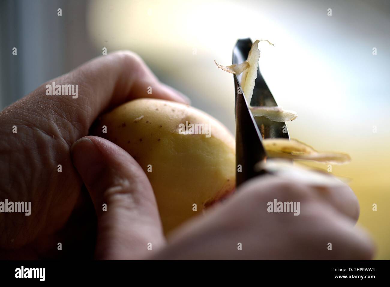 Peeling potatoes Photo Janerik Henriksson / TT code 10010 Stock Photo ...