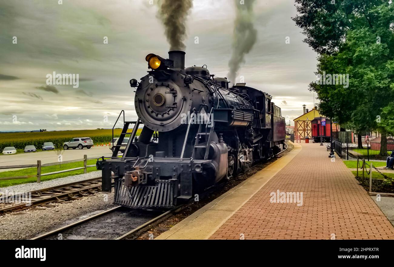 A Restored Steam Engine Getting Ready for Service, Blowing Smoke and ...