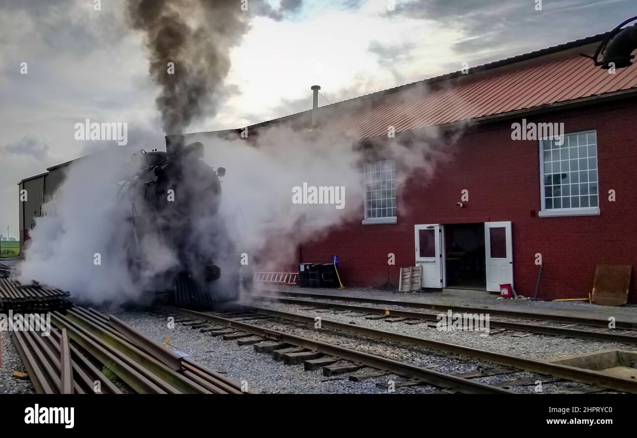 A Restored Steam Engine Getting Ready for Service, Blowing Smoke and ...