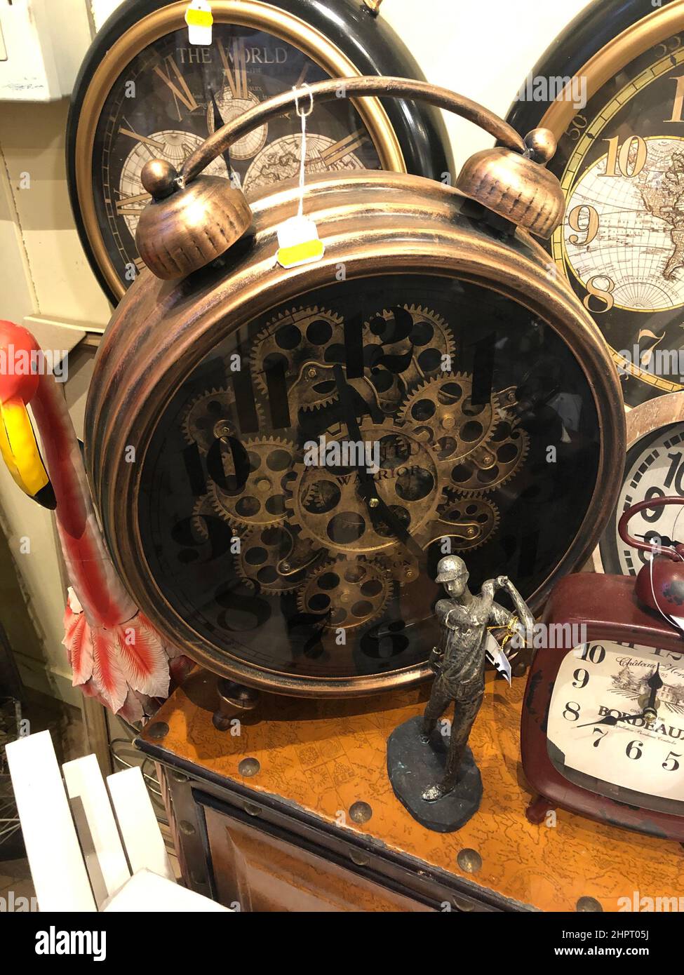 The dials of the old antique classic clocks on a vintage wide paper ...