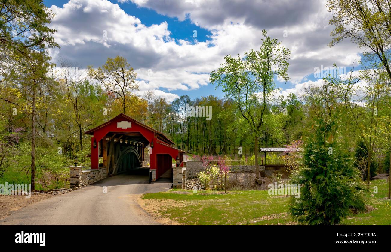 View of a Restored Burr Truss Covered Bridge on a Country Road With ...