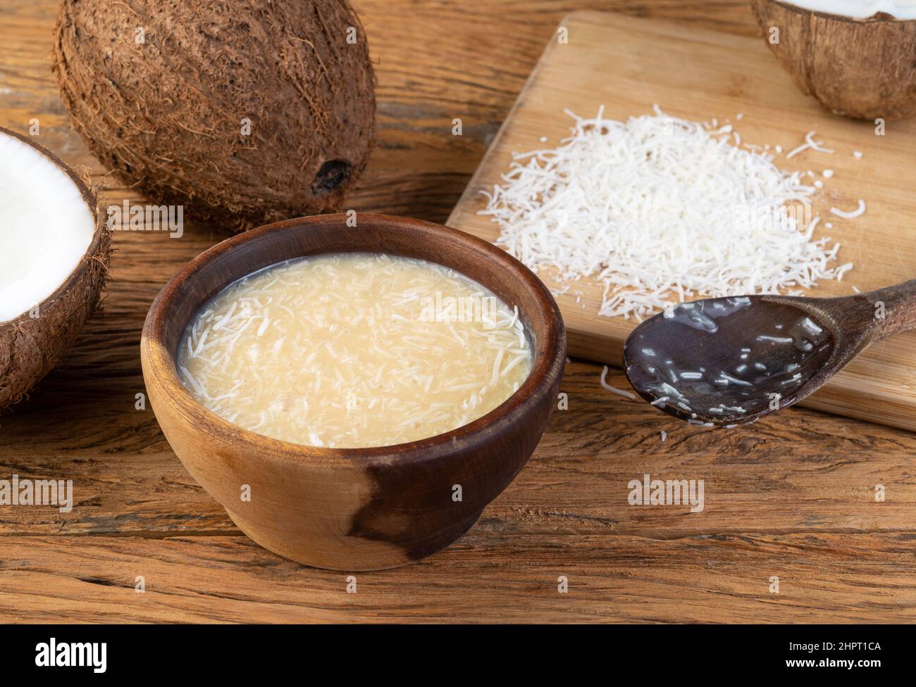 Creamy cocada, traditional brazilian coconut candy with grated coconut ...
