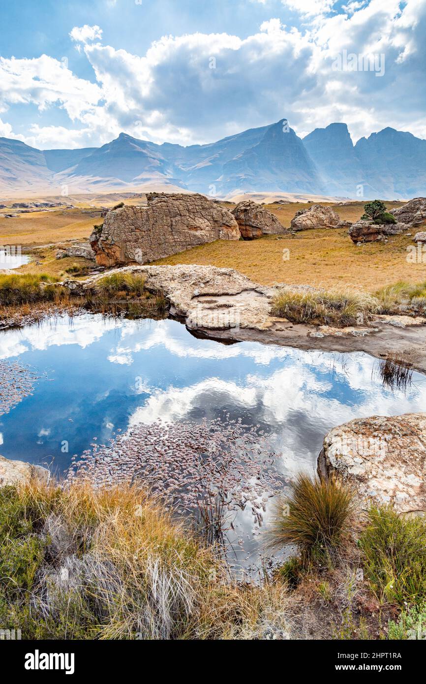 Travel to Lesotho. Ponds, grassland and rock formations and hills of ...