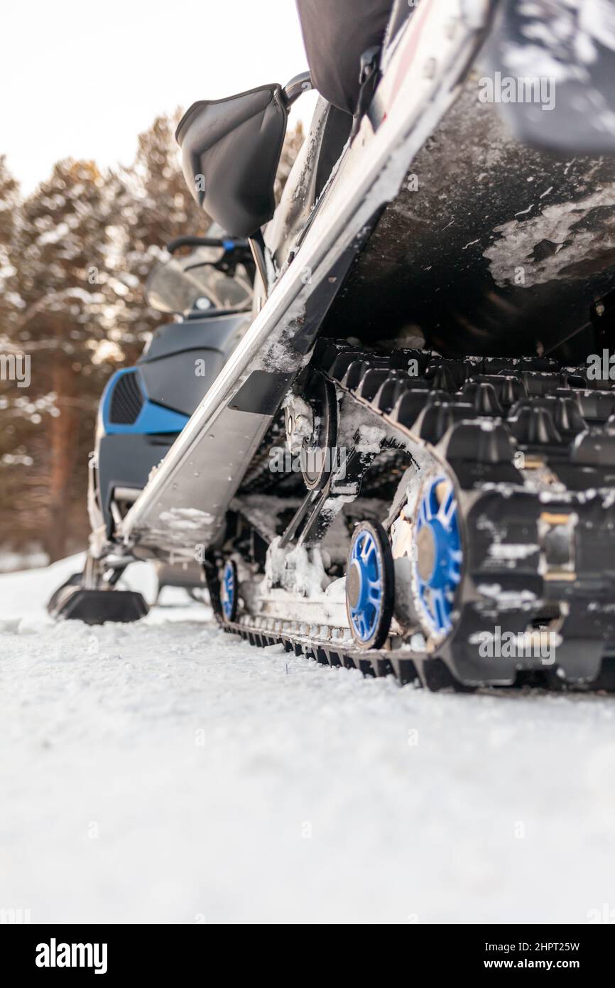 The back of the snowmobile in winter. Riding in the snow on a ...