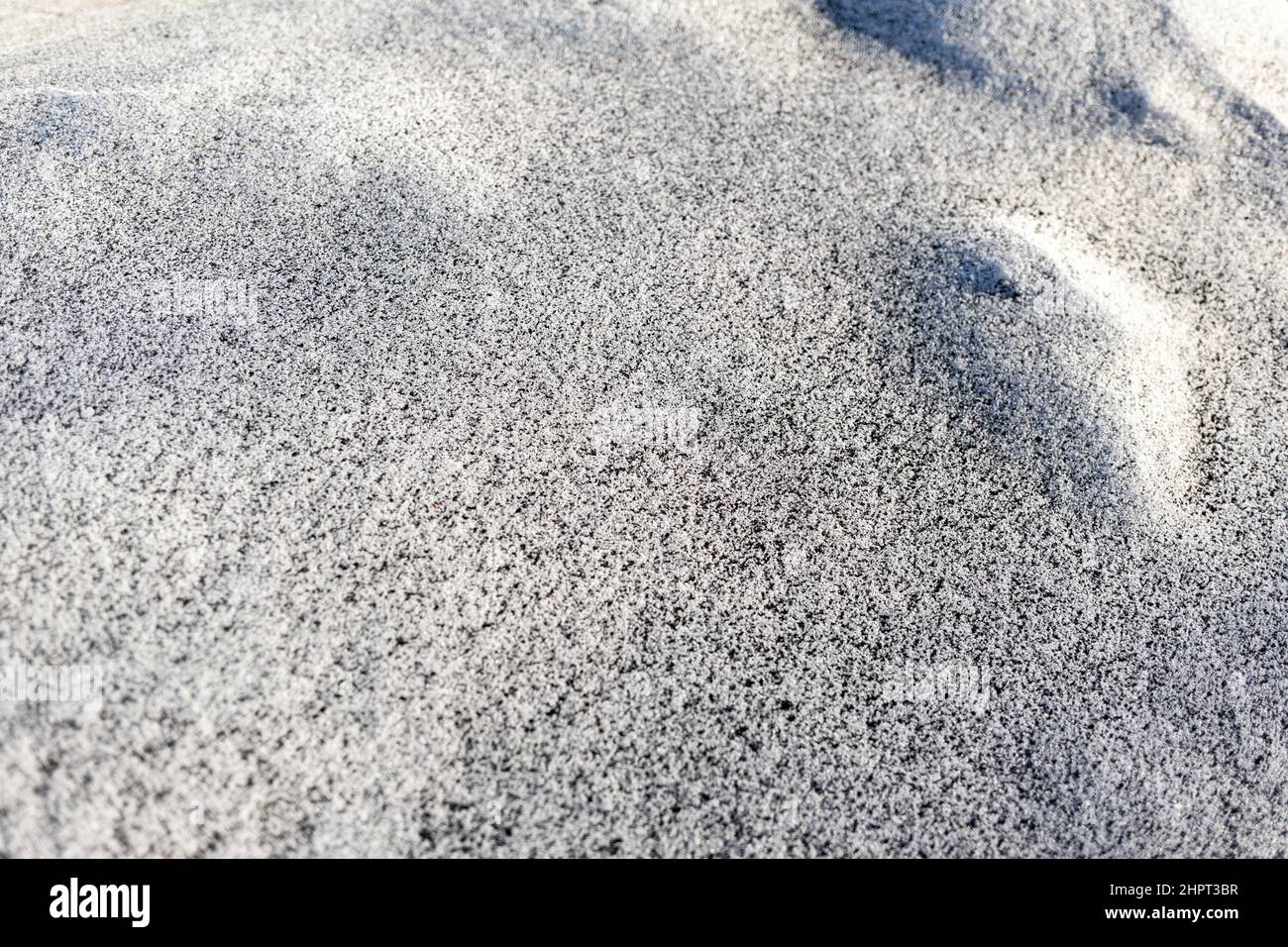Black soot from the boiler room on white snow. Natural background. Snow ...