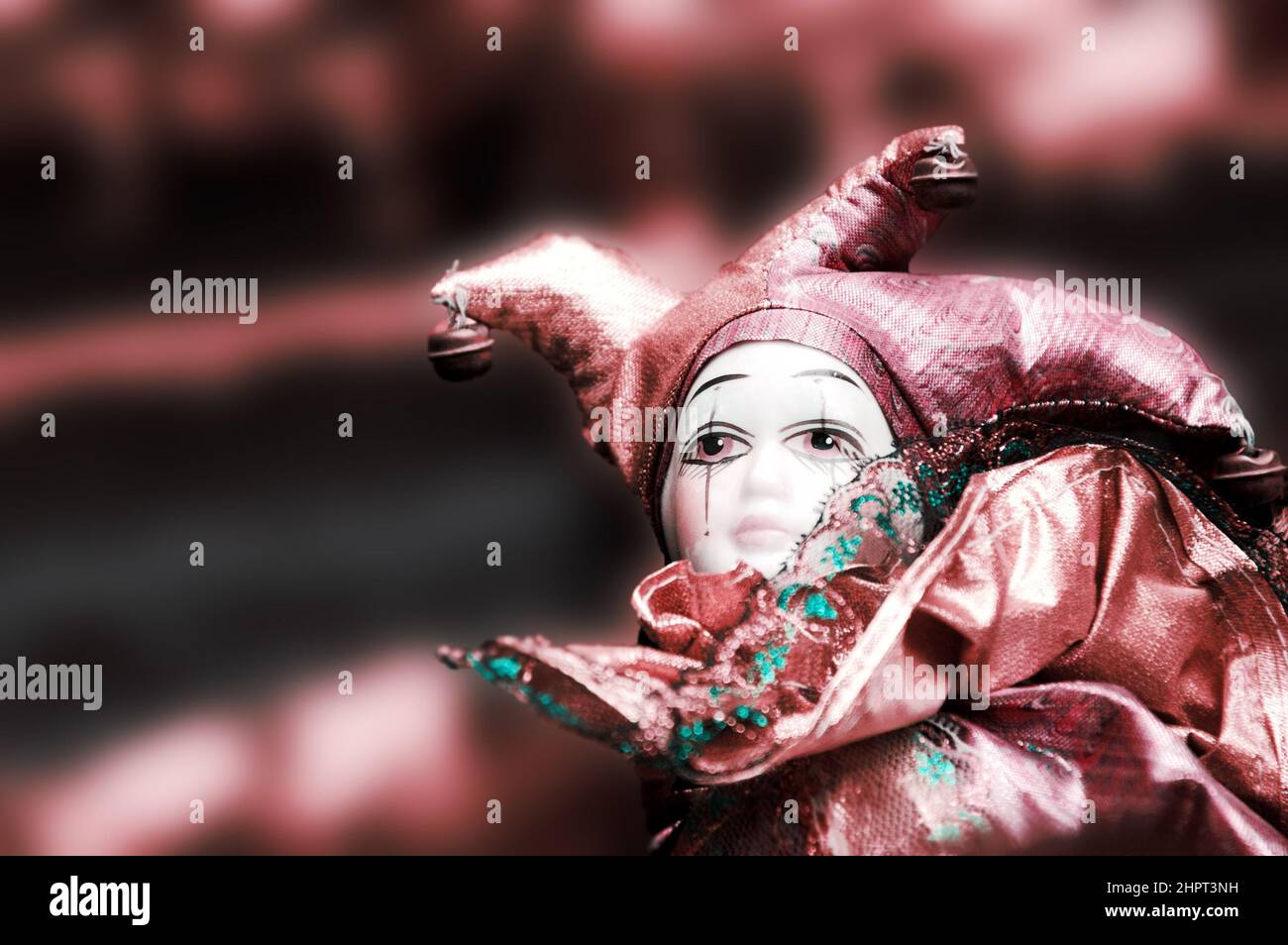 Vintage sad clown puppet on blurred background. Toned photo Stock Photo ...