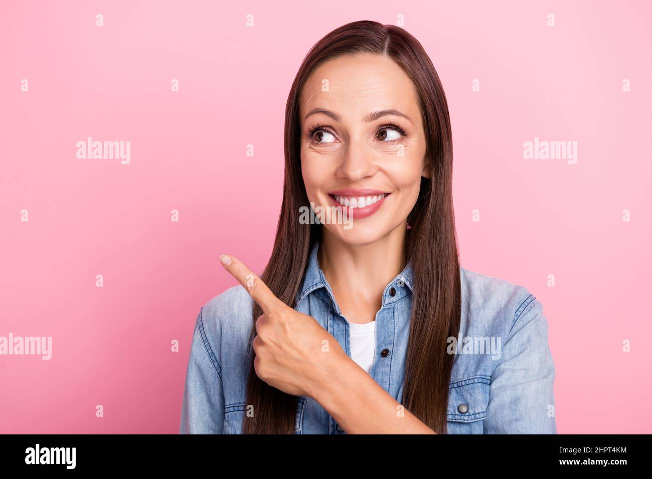 Photo of funky mature brown hairdo lady indicate look empty space wear ...