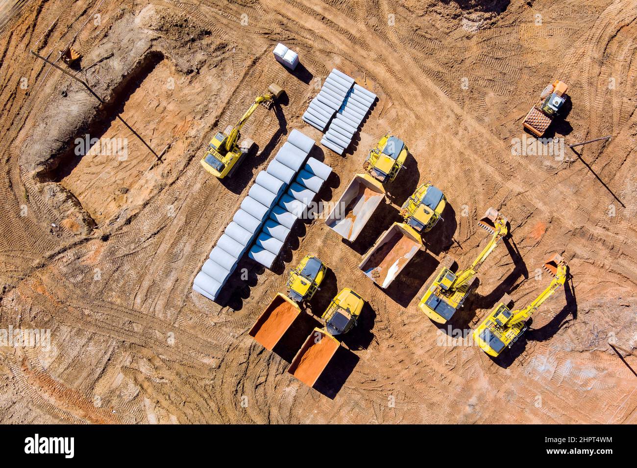 Heavy tractor machinery excavator align the earth doing landscaping ...
