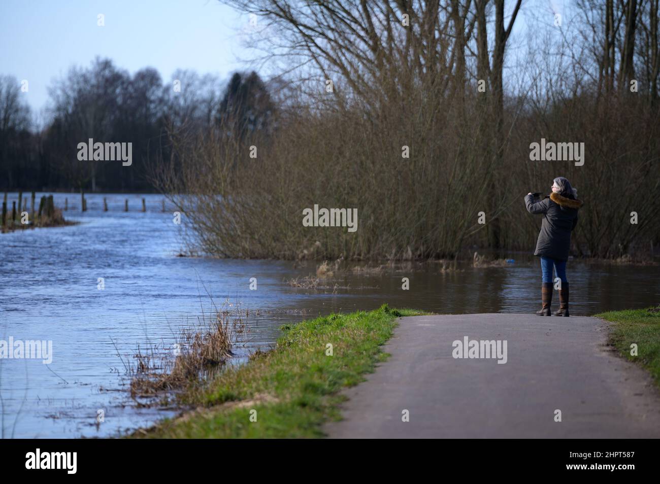 Pinneberg, Germany. 23rd Feb, 2022. A woman takes a picture with her ...
