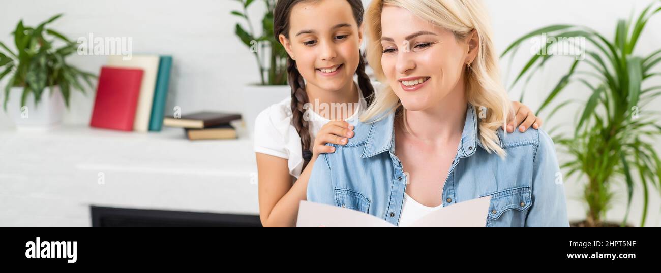 Mother and daughter doing homework together Stock Photo - Alamy
