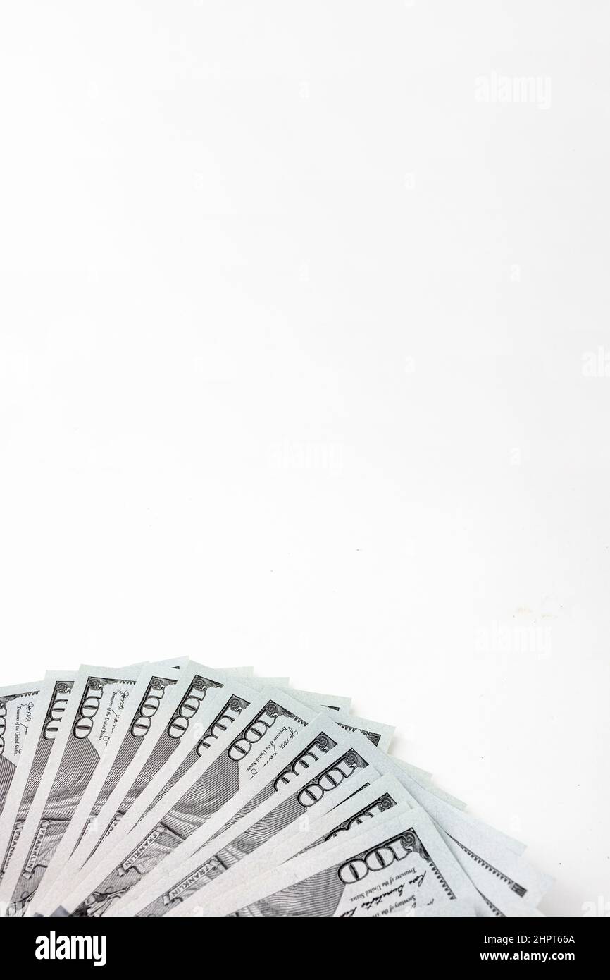 Dollar USA close up. Several 100 US money notes spread out in fan shape ...