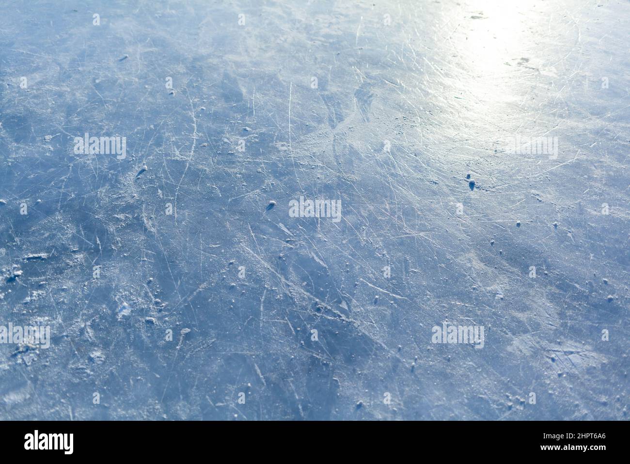 Empty ice rink with skate marks after the session outdoor. skating ice ...