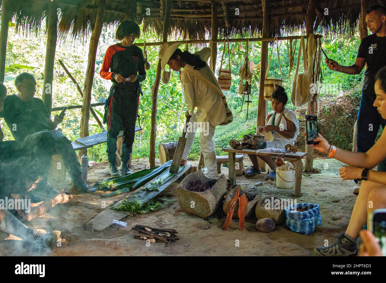 A demonstration by indigenous Kogi people to a tour group in Sierra ...