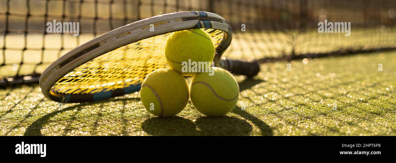 Tennis game. Tennis ball with racket on the tennis court. Sport ...