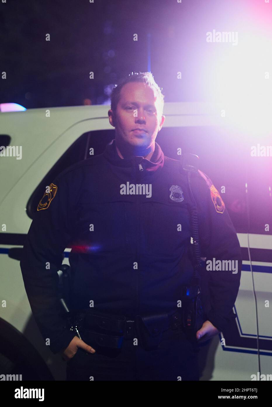 Working the night shift. Cropped portrait of a handsome young policeman ...