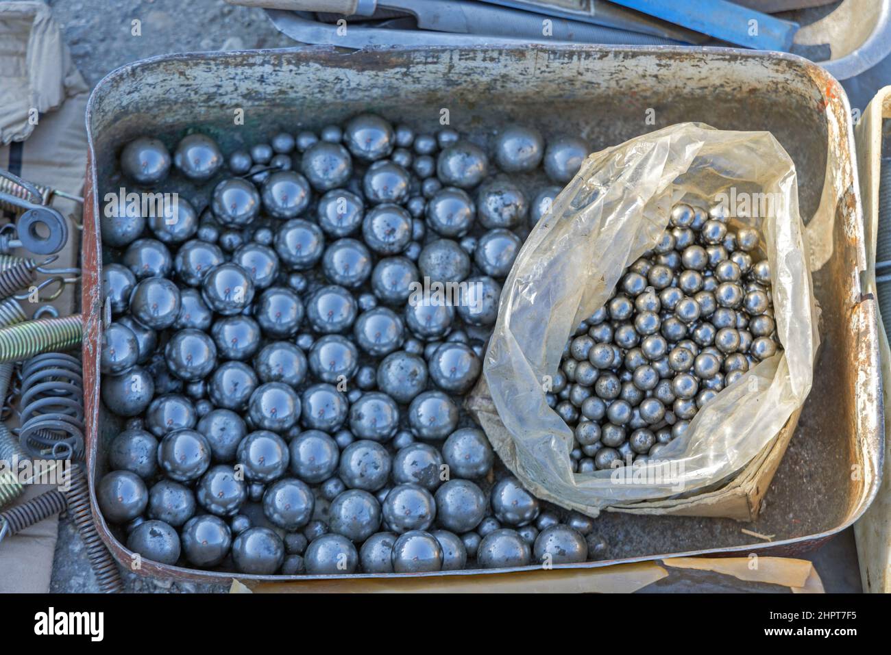 Used Dirty Steel Metal Balls in Box Stock Photo - Alamy