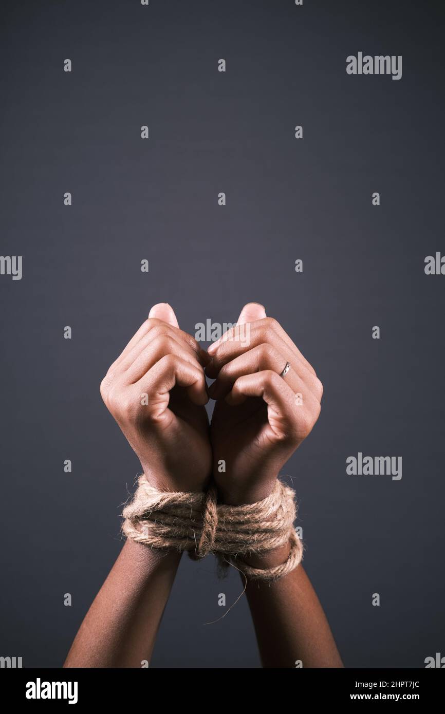 Hands tied with rope hi-res stock photography and images - Alamy