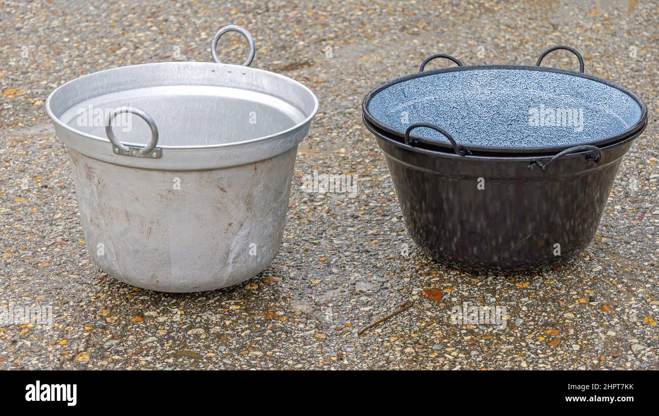 Large Metal Cooking Cauldron Pots With Handles Stock Photo - Alamy