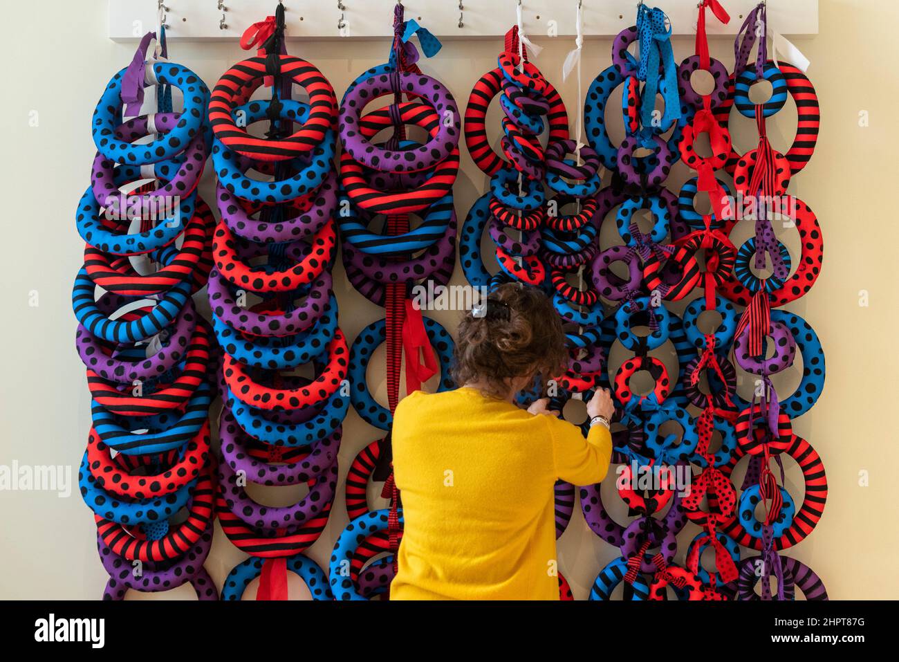 London, UK. 23 February 2022. Textile artist Anna Ray with her work ...