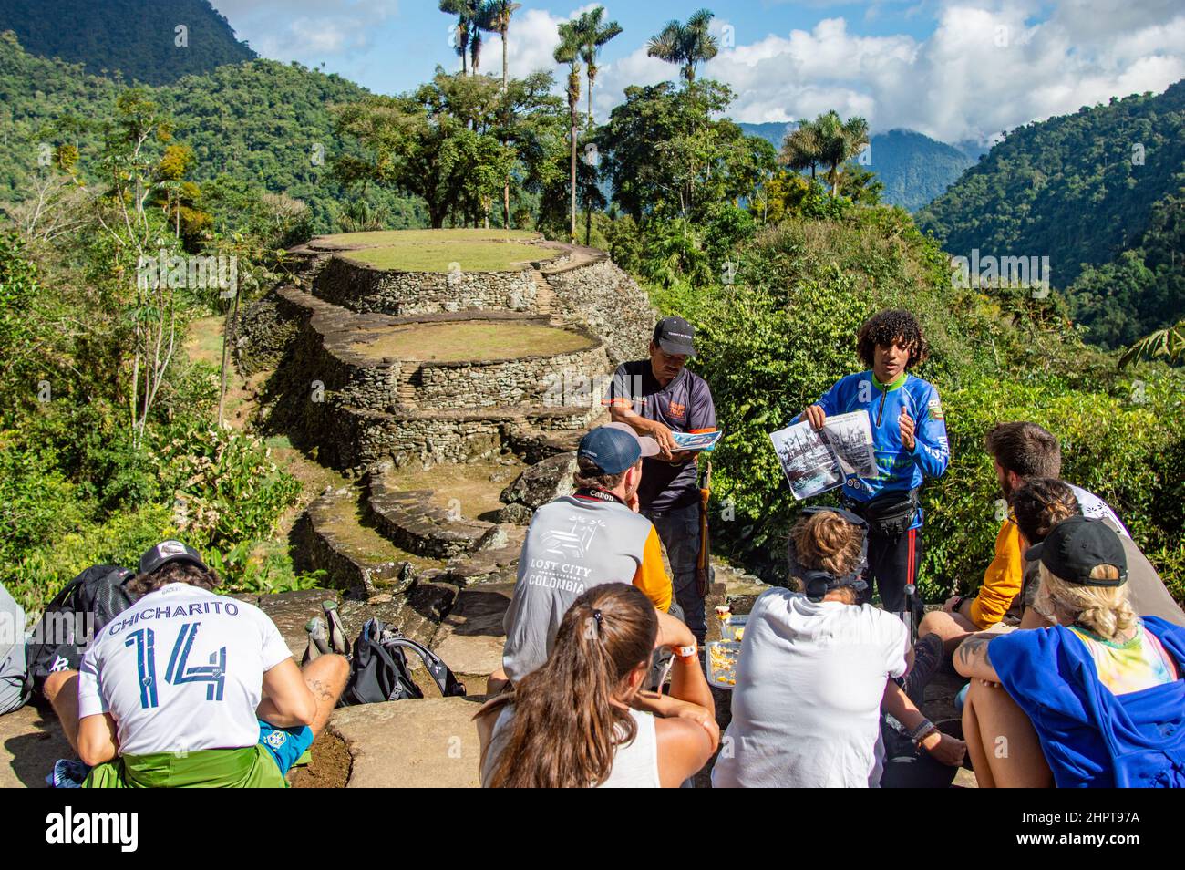 A tour guide talking to a group about the Lost City/Ciudad Perdida in ...