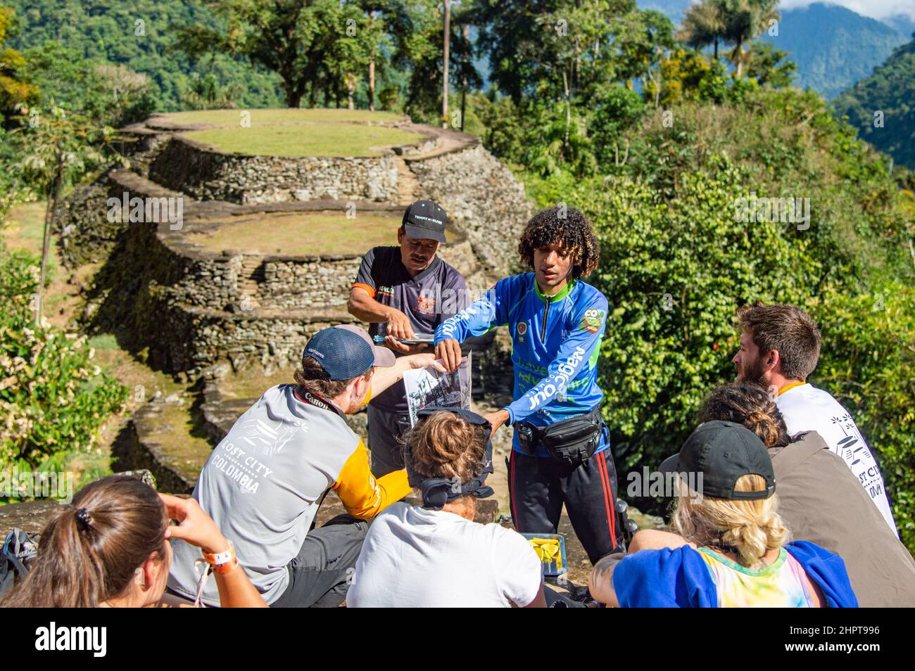A tour guide talking to a group about the Lost City/Ciudad Perdida in ...