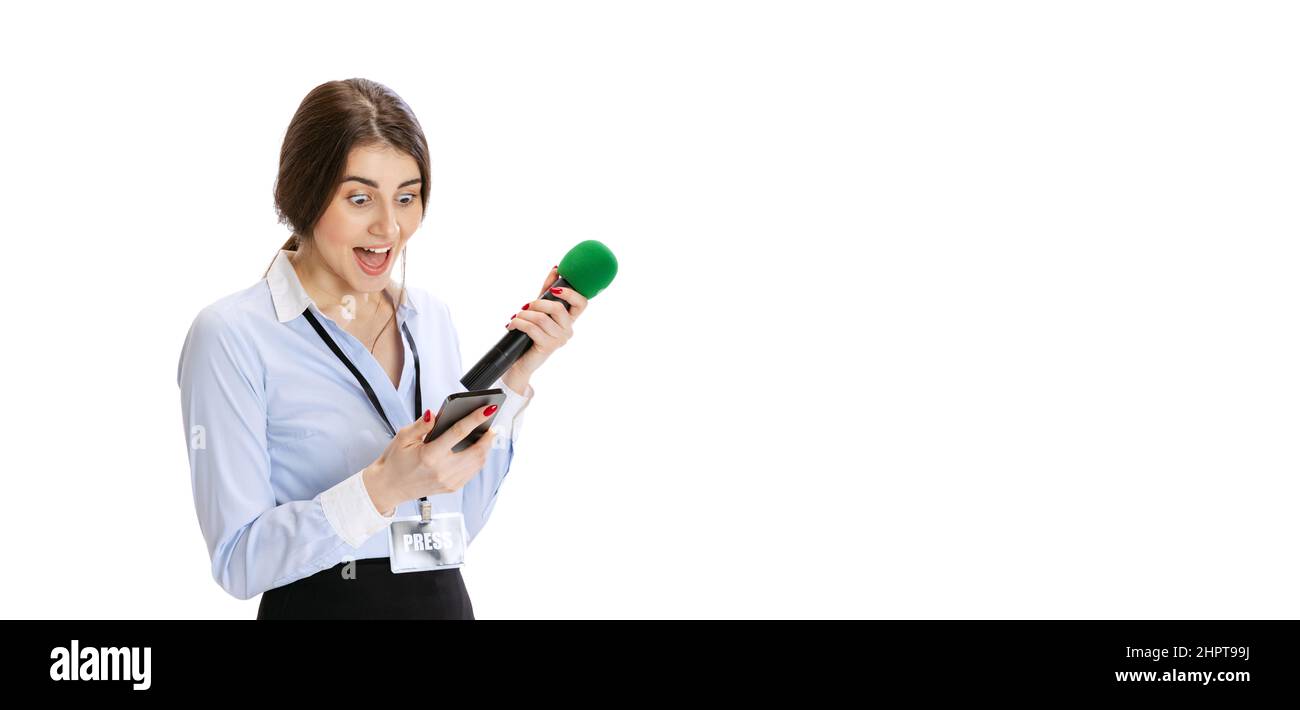 Excited young girl, female journalist holding reporter microphone and ...