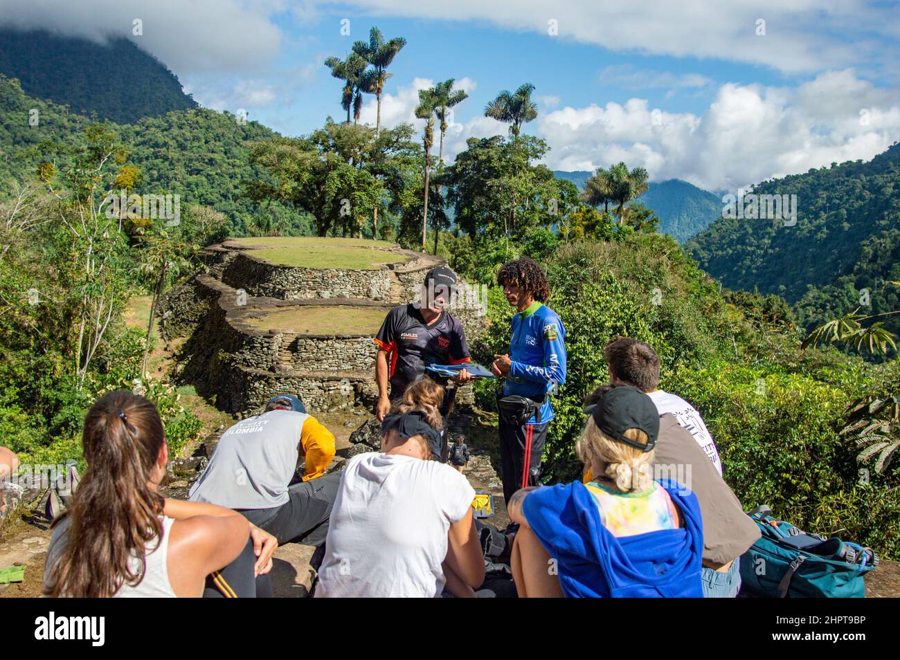A tour guide talking to a group about the Lost City/Ciudad Perdida in ...