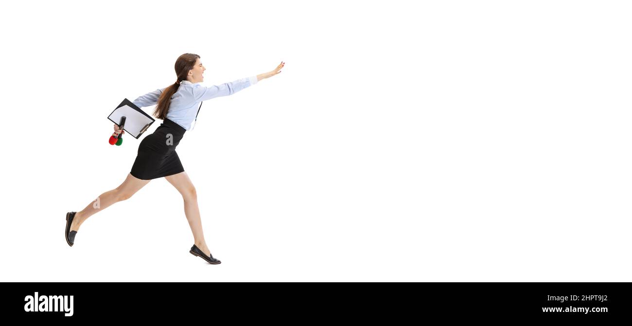 Be late for an interview. Female journalist holding reporter microphone ...