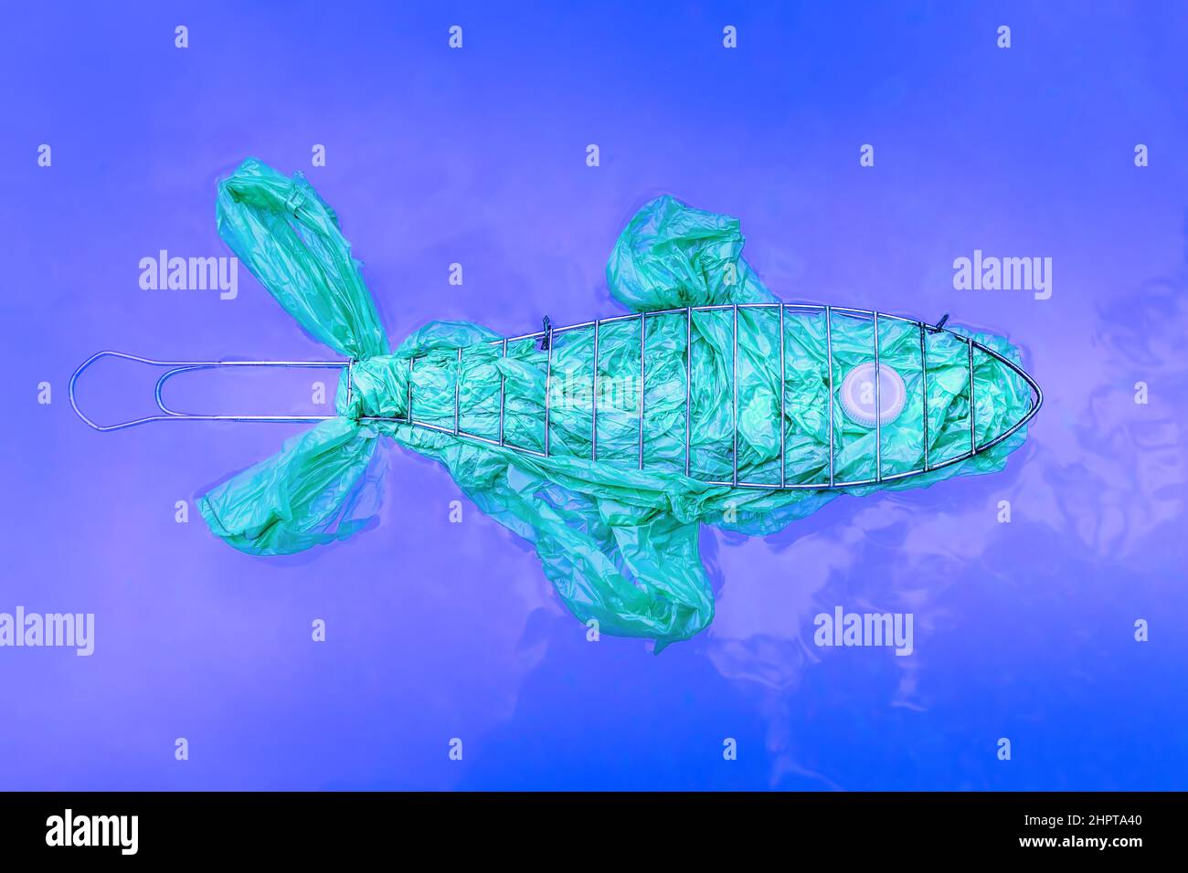 Plastic fish in the water, concept of environmental pollution with ...