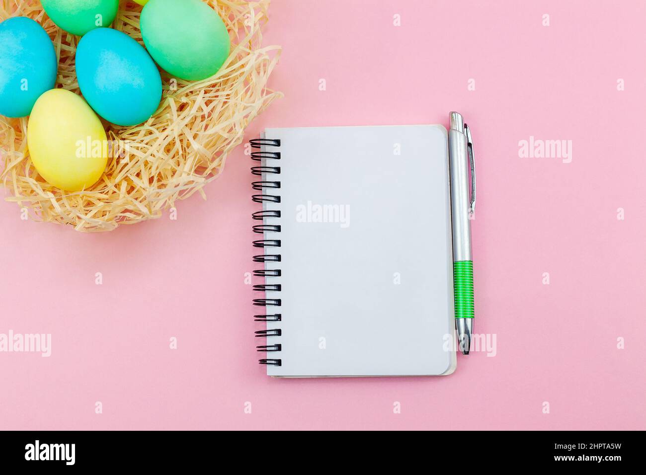 Blank notepad and pen on trendy dark pink background. Notebook for ...