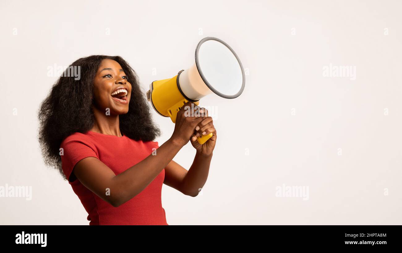 Great Promo. Excited Black Lady Using Megaphone For Making Announcement ...