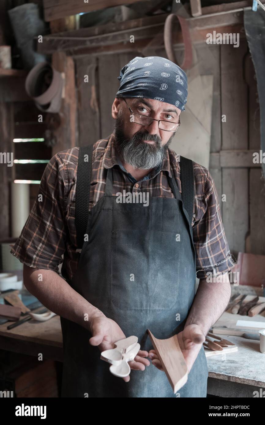 Carpenter making wooden spoon hi-res stock photography and images - Alamy