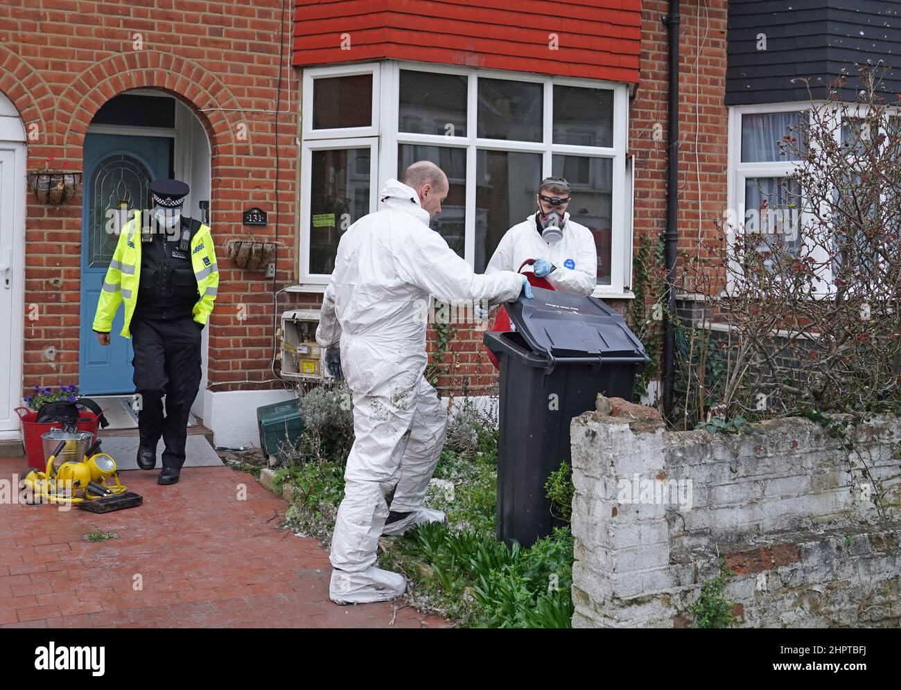 Forensic officers at the scene of a house fire on Windsor Road, Ilford ...