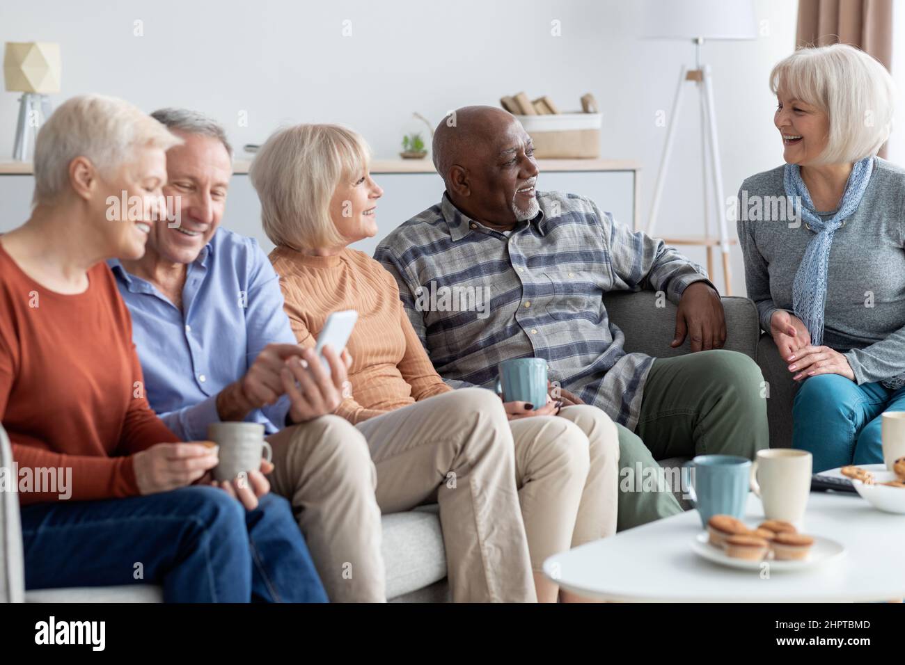 International group of cheerful elderly people chilling together Stock ...