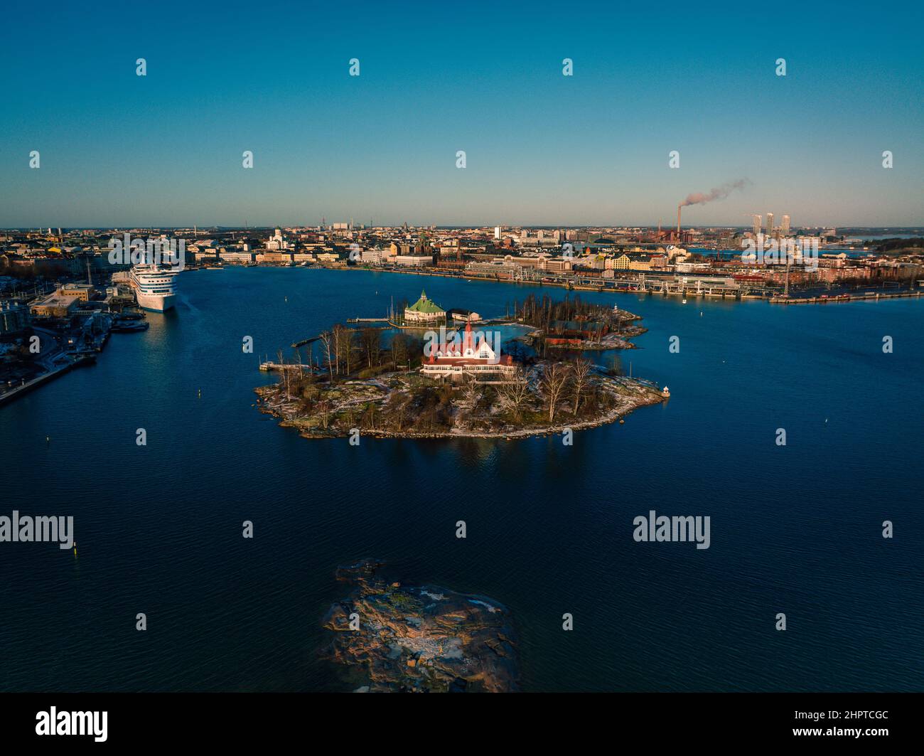 Aerial view of islets on a lake or river surrounded by town buildings ...