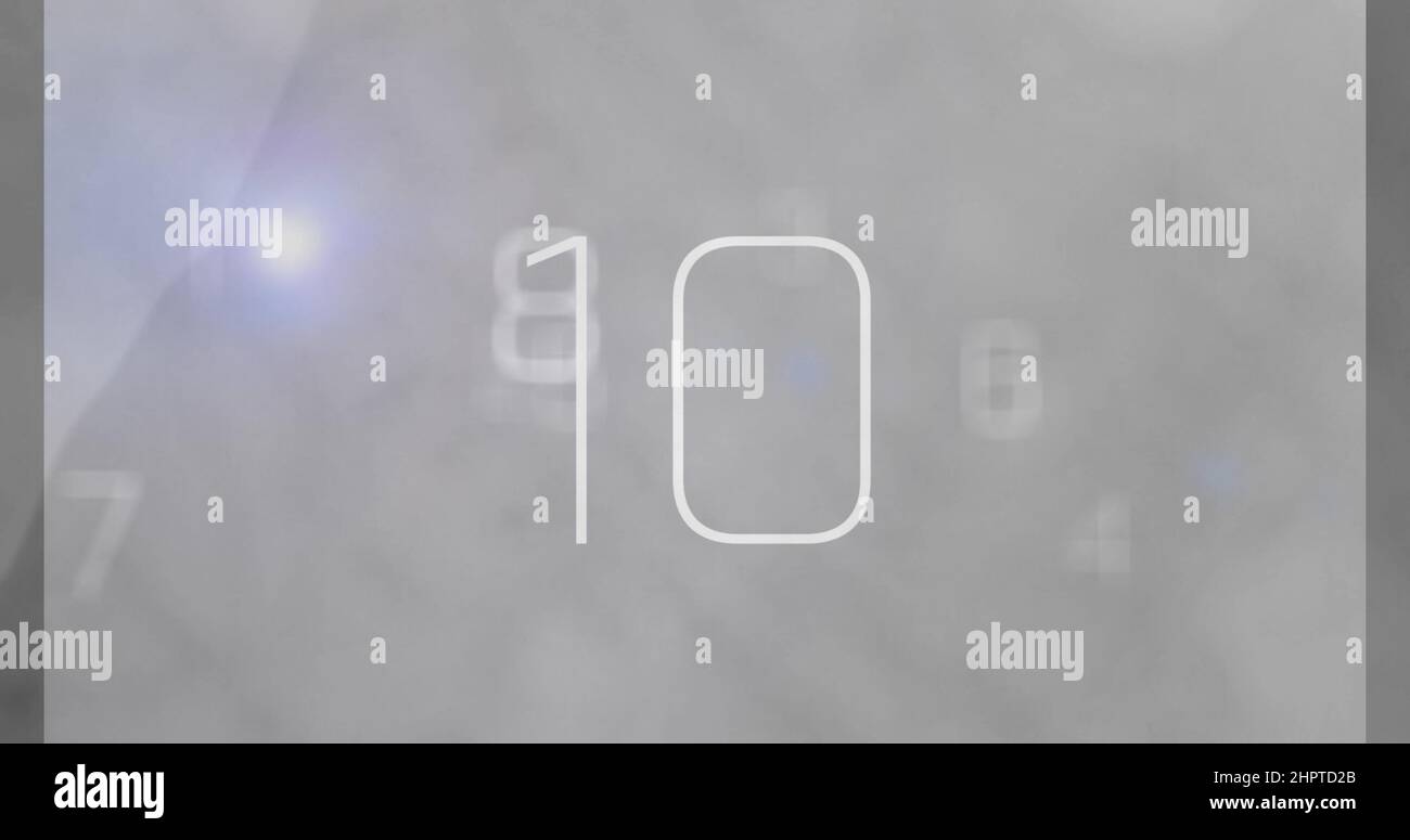 Image of changing numbers over white background Stock Photo - Alamy