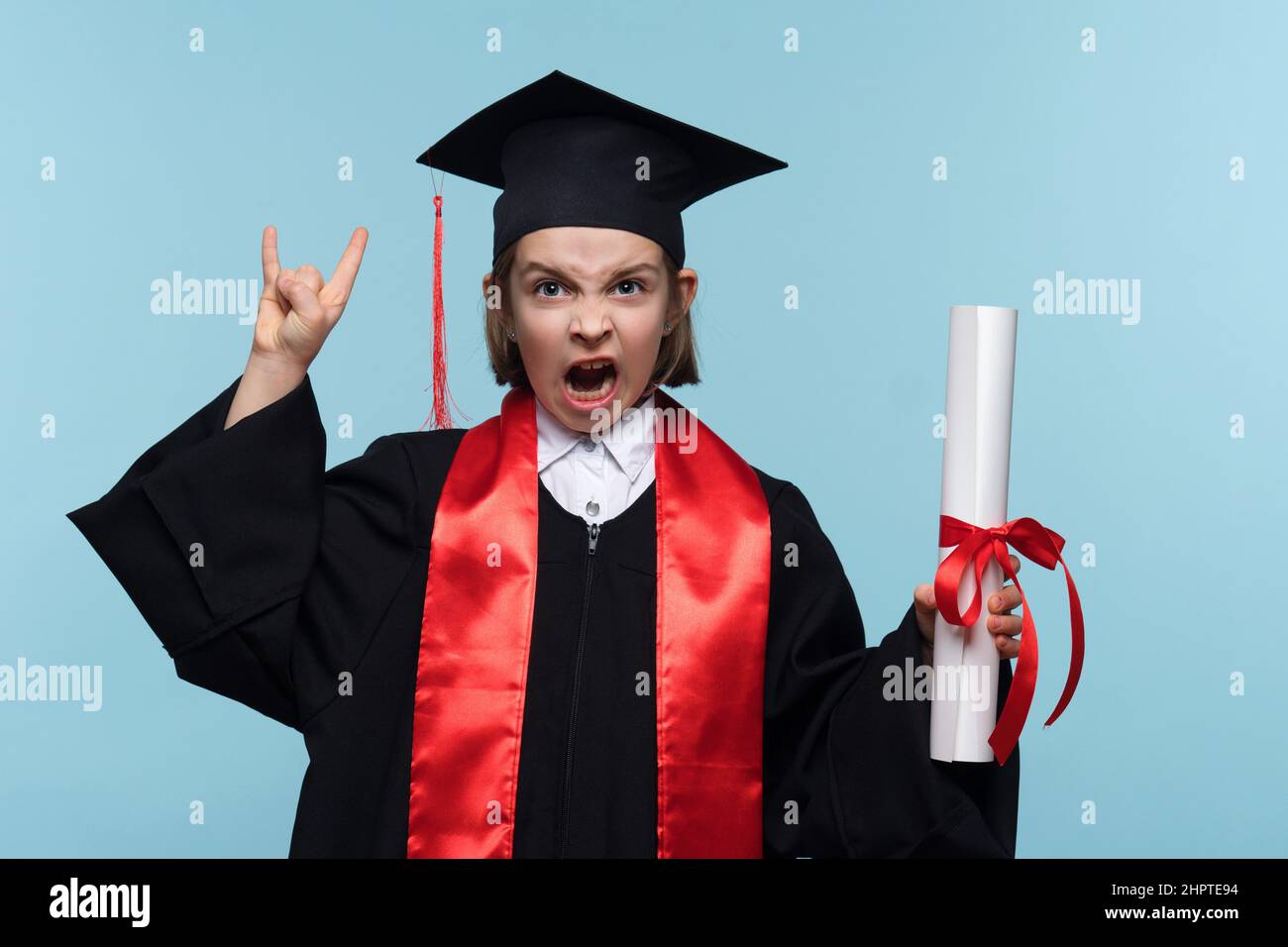 Proud Child whizz kid in graduate suit with certificate diploma on ...