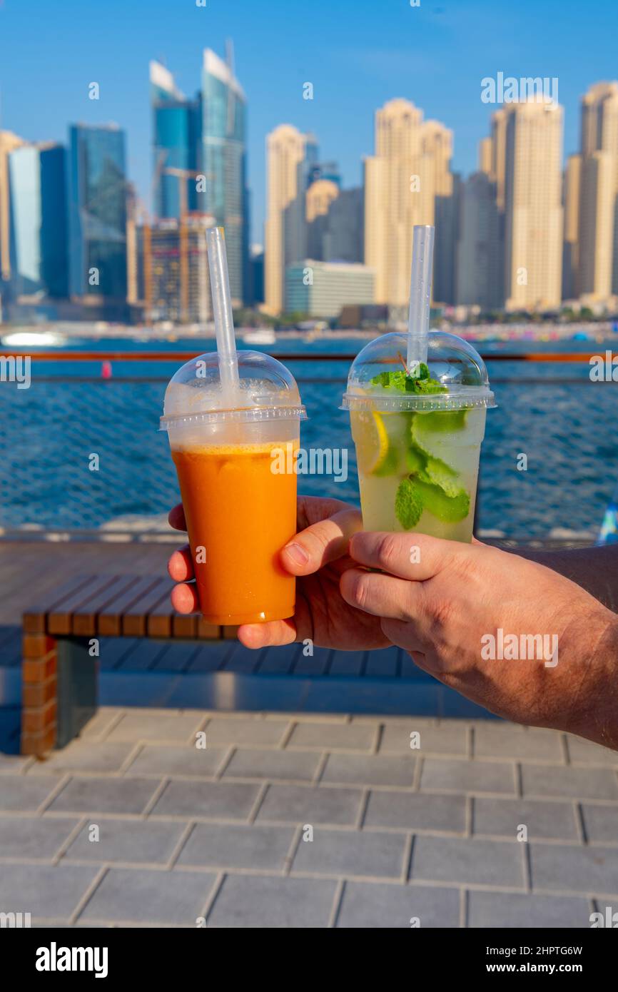 two cold drink green and orange delicious very Stock Photo - Alamy