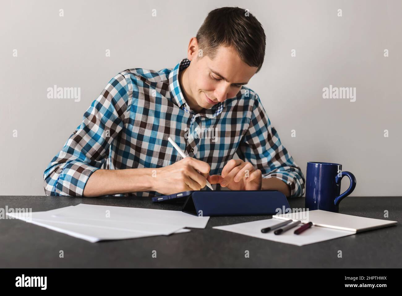 Young man working drawing tablet hi-res stock photography and images ...