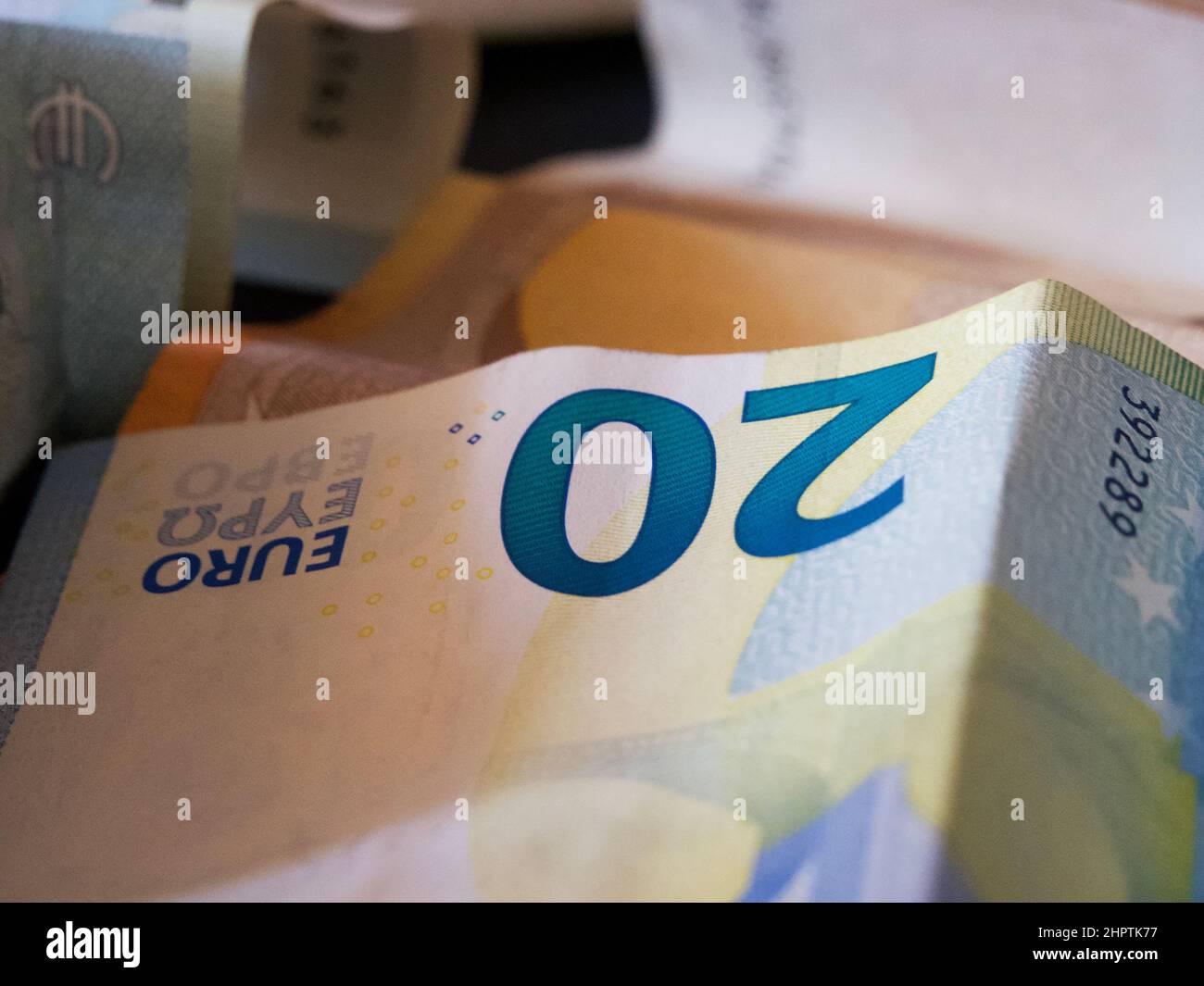 A fragment of a twenty-euro bill in close-up. A 20 euro banknote ...