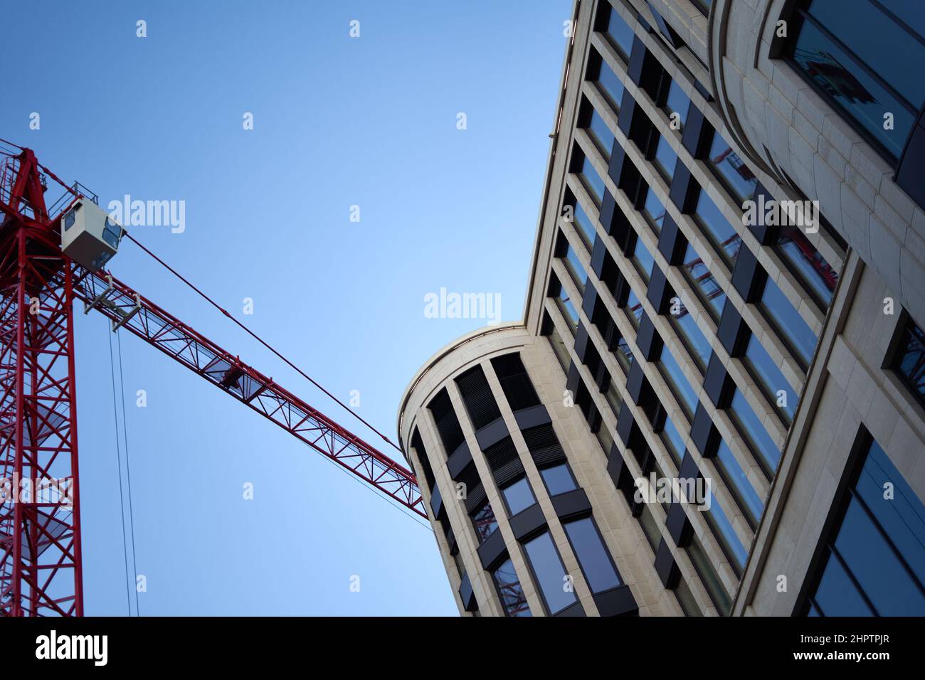 Building facade with semi-circular segments and reflective glass ...