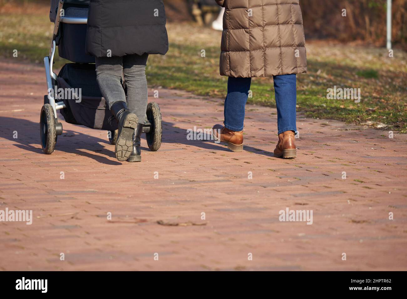 Women pushing strollers hi-res stock photography and images - Alamy