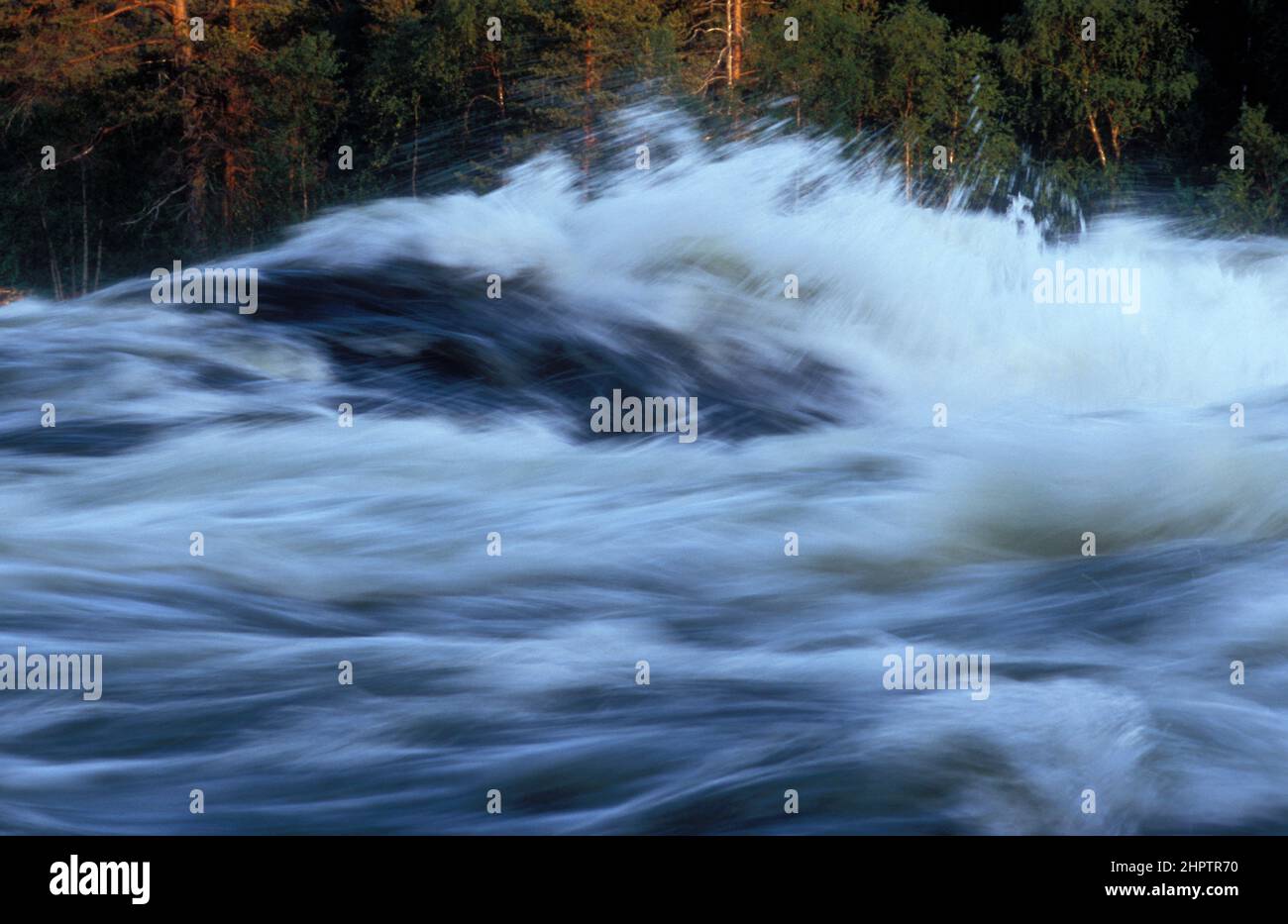 Wild river rapids in the country in 2005, analog. Fast, strong, and ...
