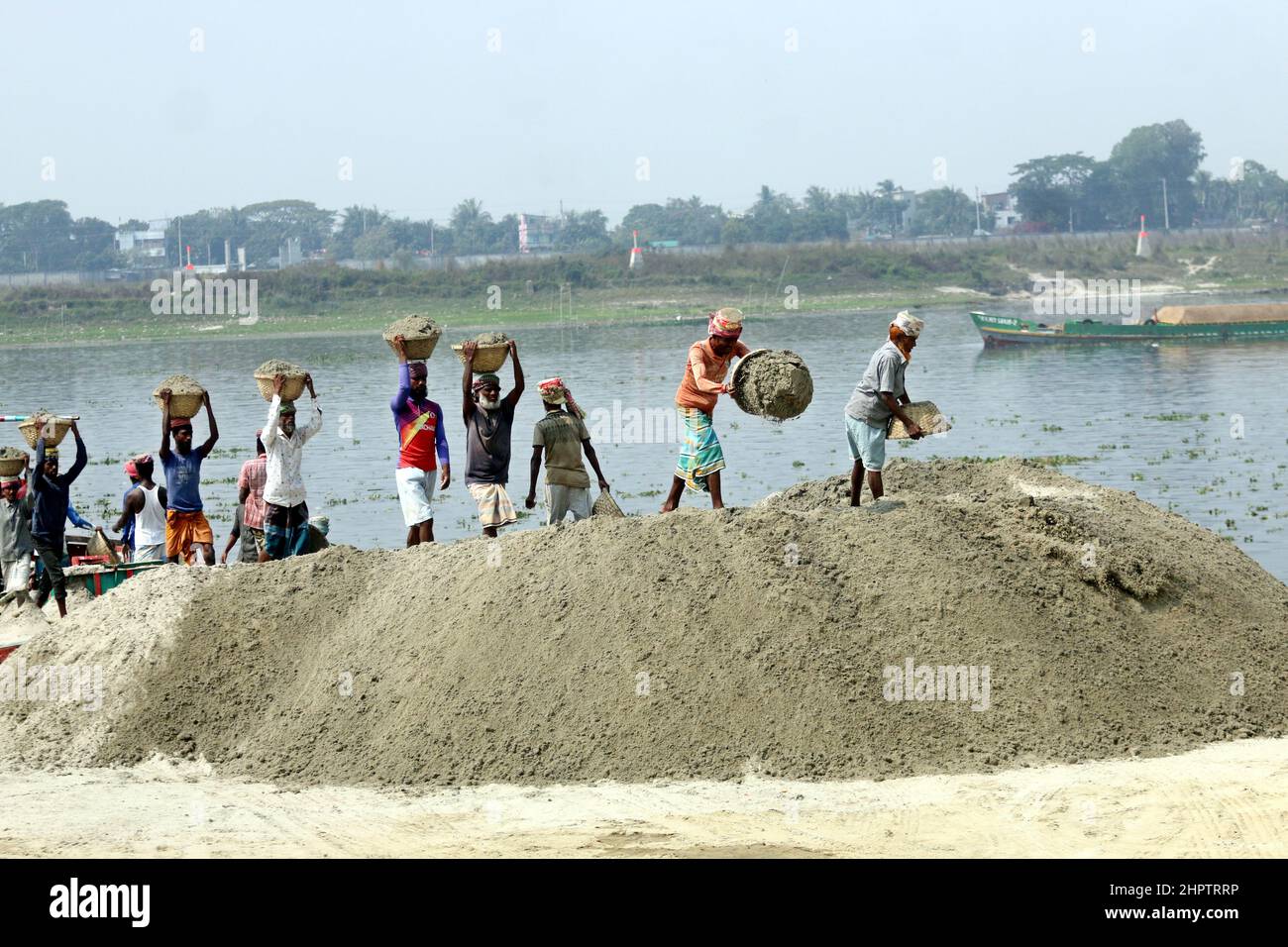 DHAKA,BANGLADESH,FEBRUARY23,02,2022- Labor Load-Unloading work on the ...