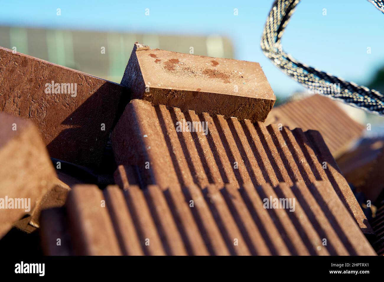 Close-up of circular construction material made from re-used waste ...