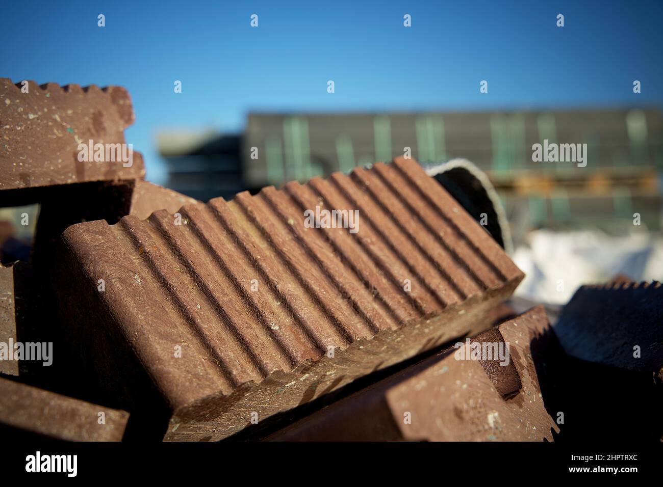 Close-up of circular construction material made from re-used waste ...