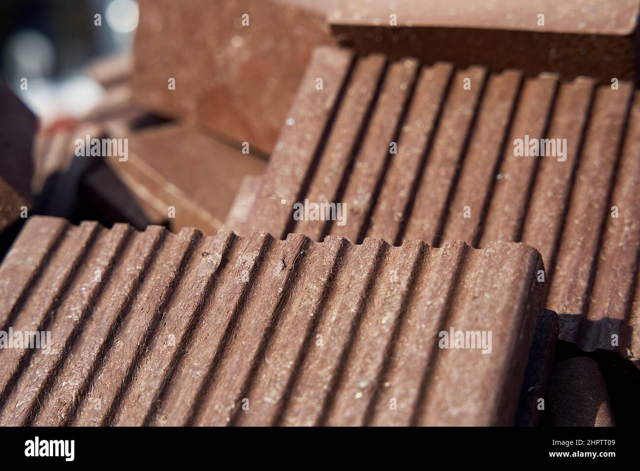 Close-up of circular construction material made from re-used waste ...